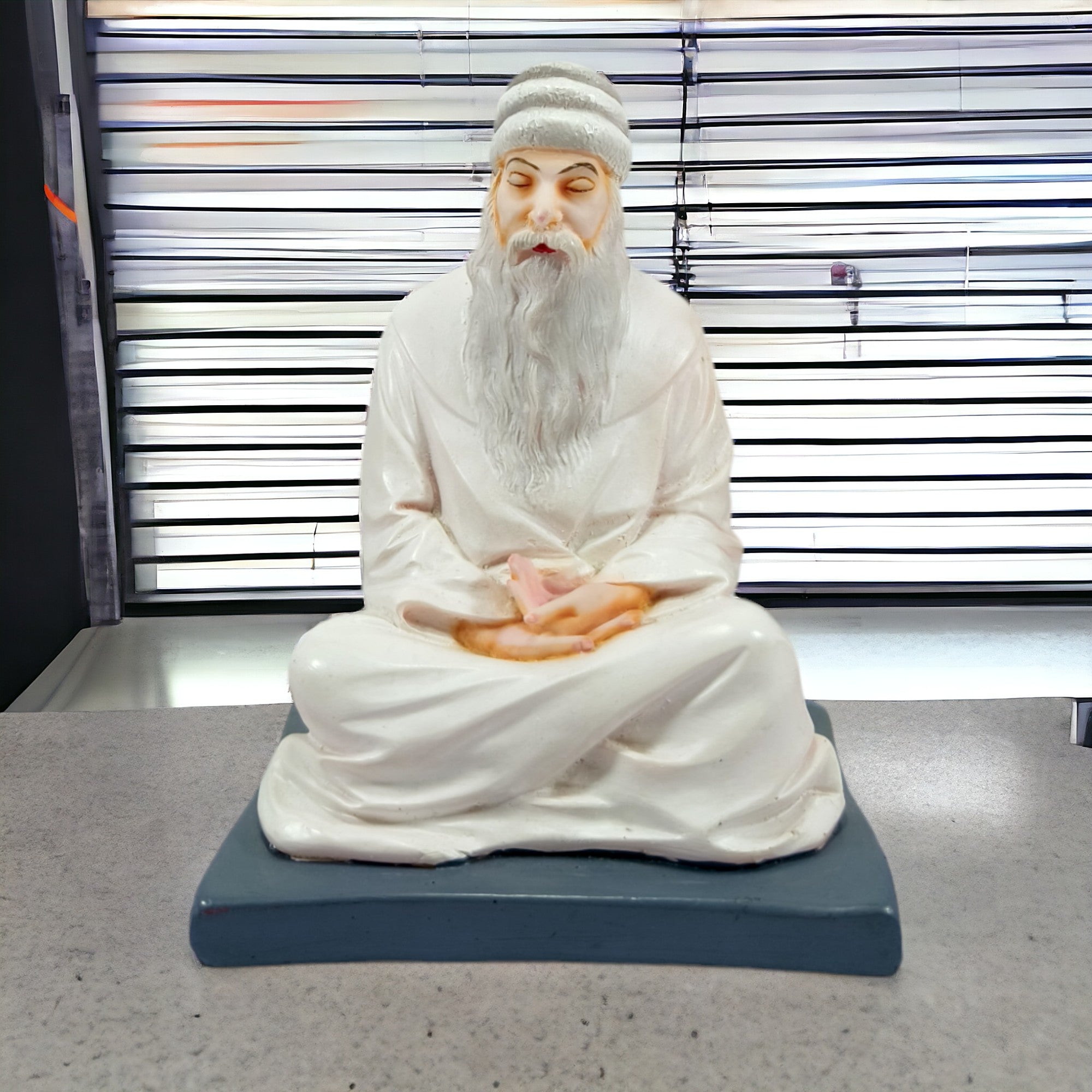 Whispers of Wisdom: Handcrafted White Osho statue – Aurance